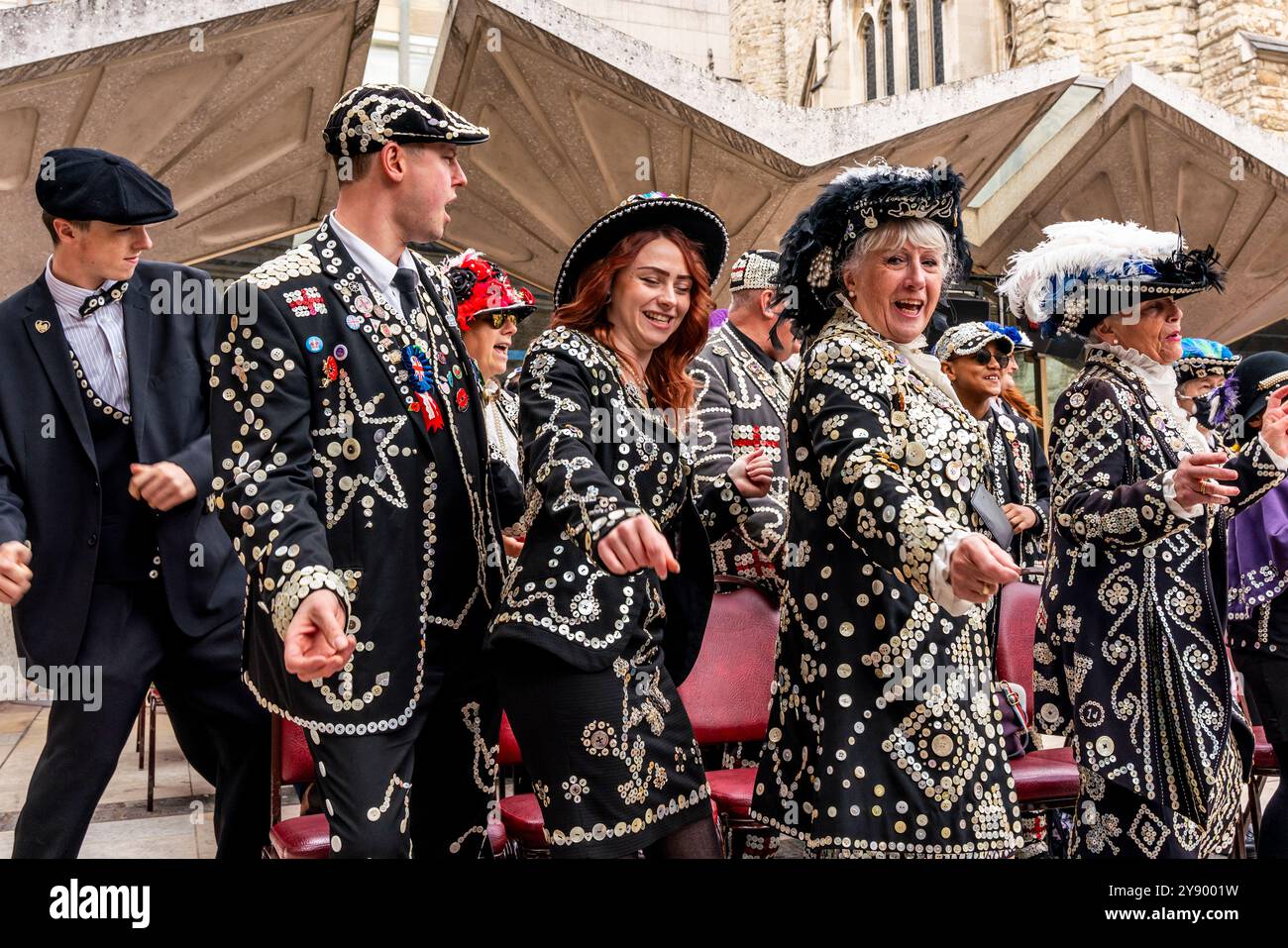 A Group of Pearly Kings and Queens Singing and Dancing To Traditional ...