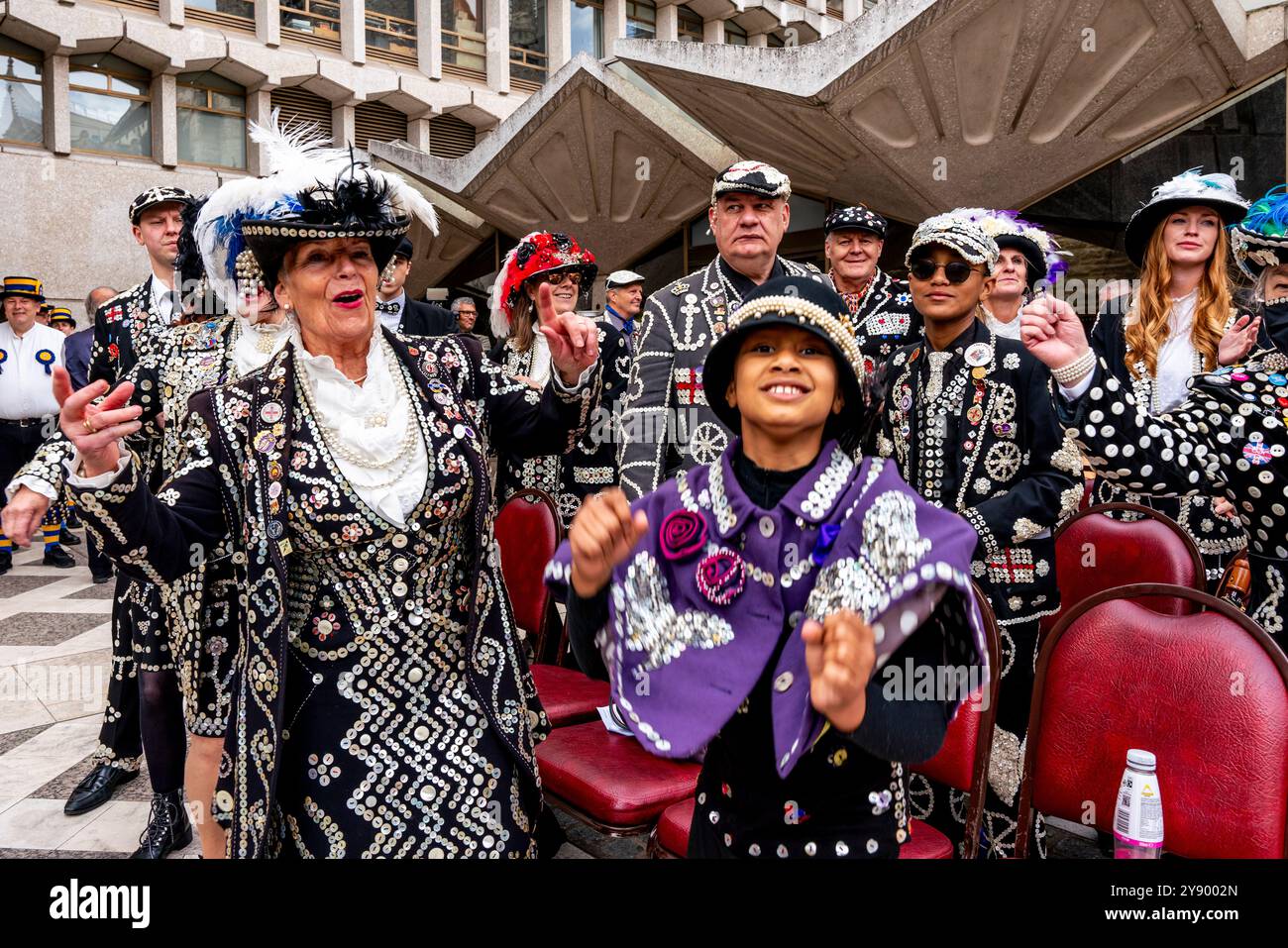 A Group of Pearly Kings and Queens Singing and Dancing To Traditional ...