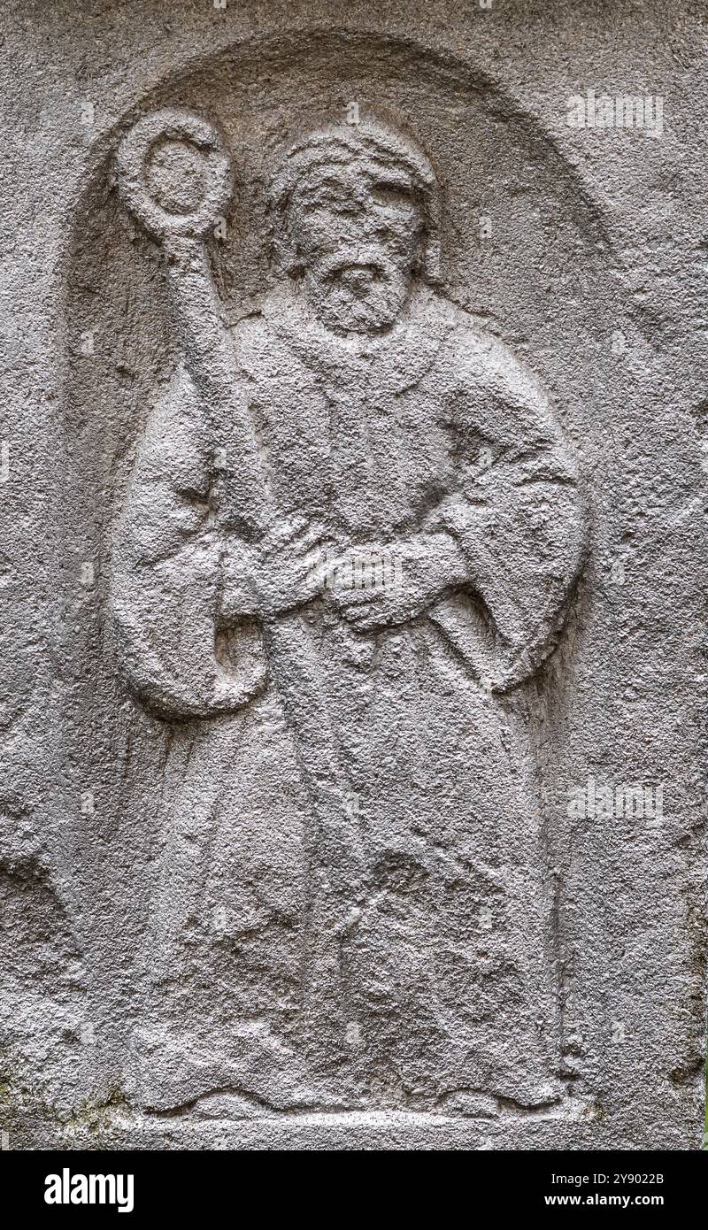 Religious figure with a staff carved on stone. Prophet. Ancient ...