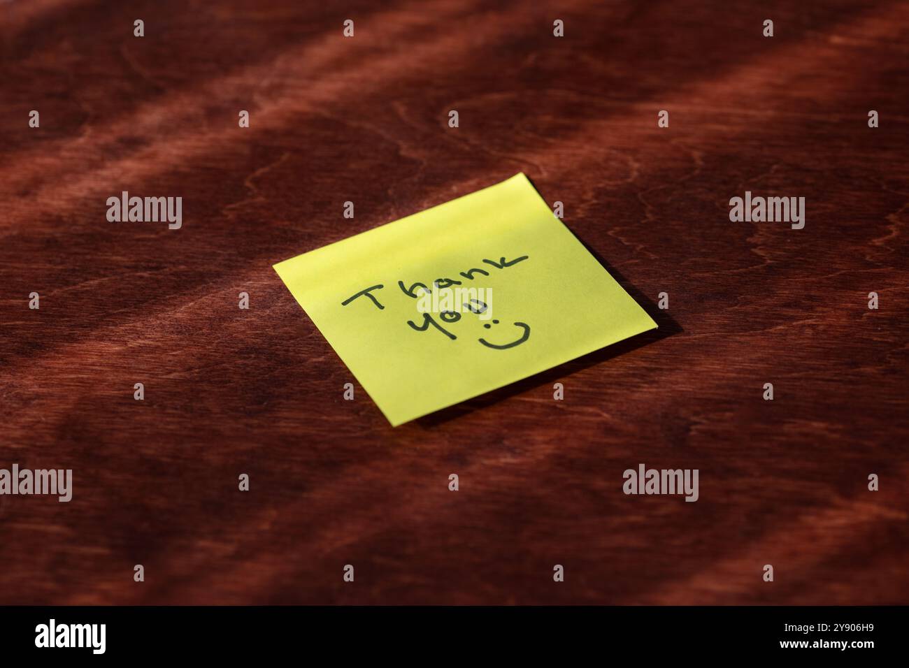 Yellow Sticky Note with Handwritten “Thank You” and Smiley Face ...