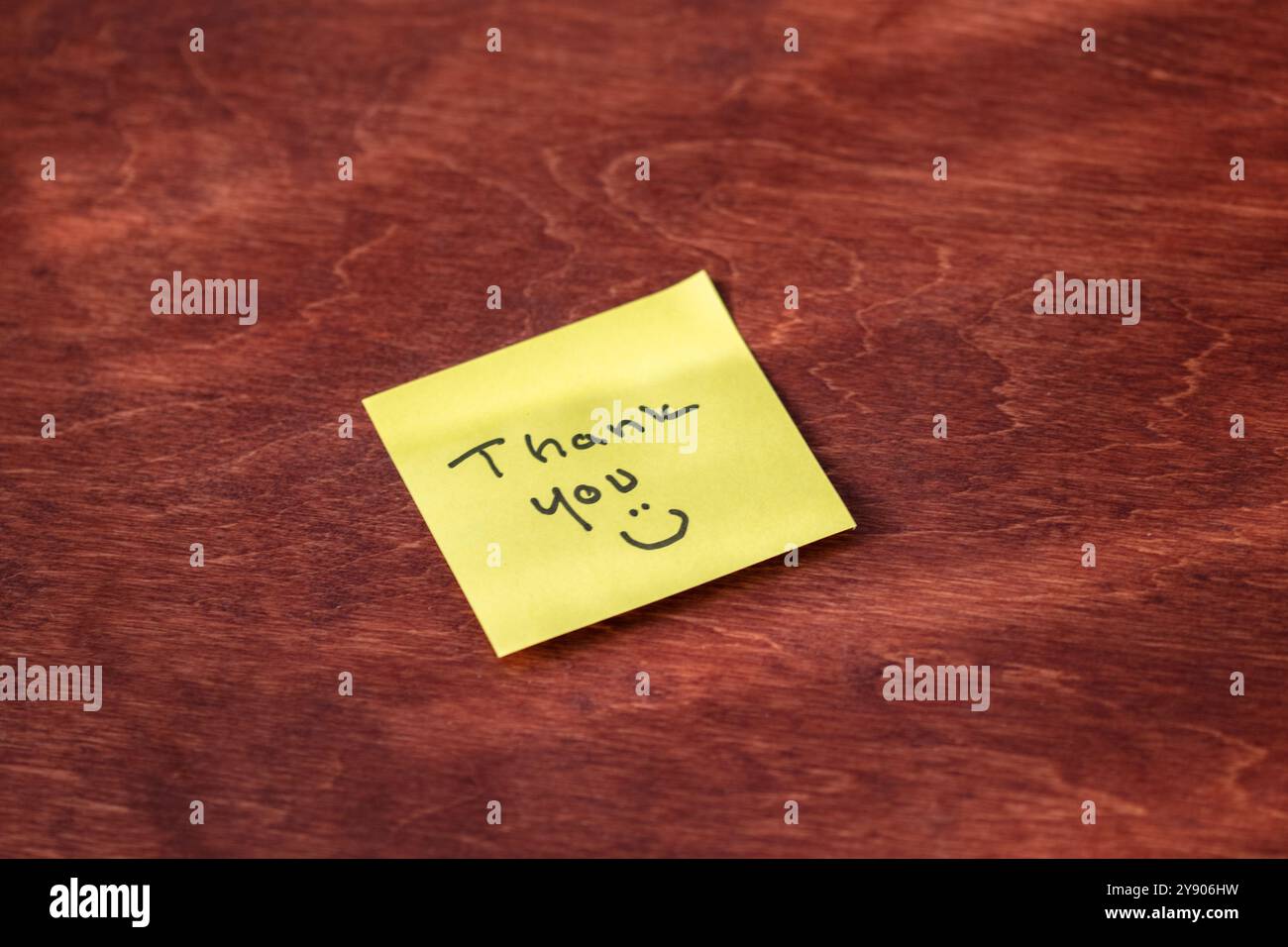 Yellow Sticky Note with Handwritten “Thank You” and Smiley Face ...