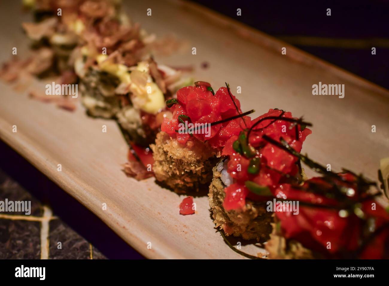 Assorted sushi rolls in Japanese restaurant Stock Photo - Alamy