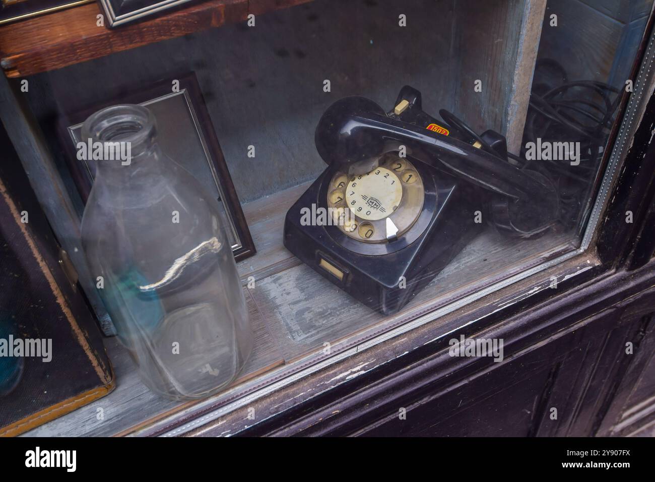Old telephone in shop display window, Budapest Stock Photo - Alamy