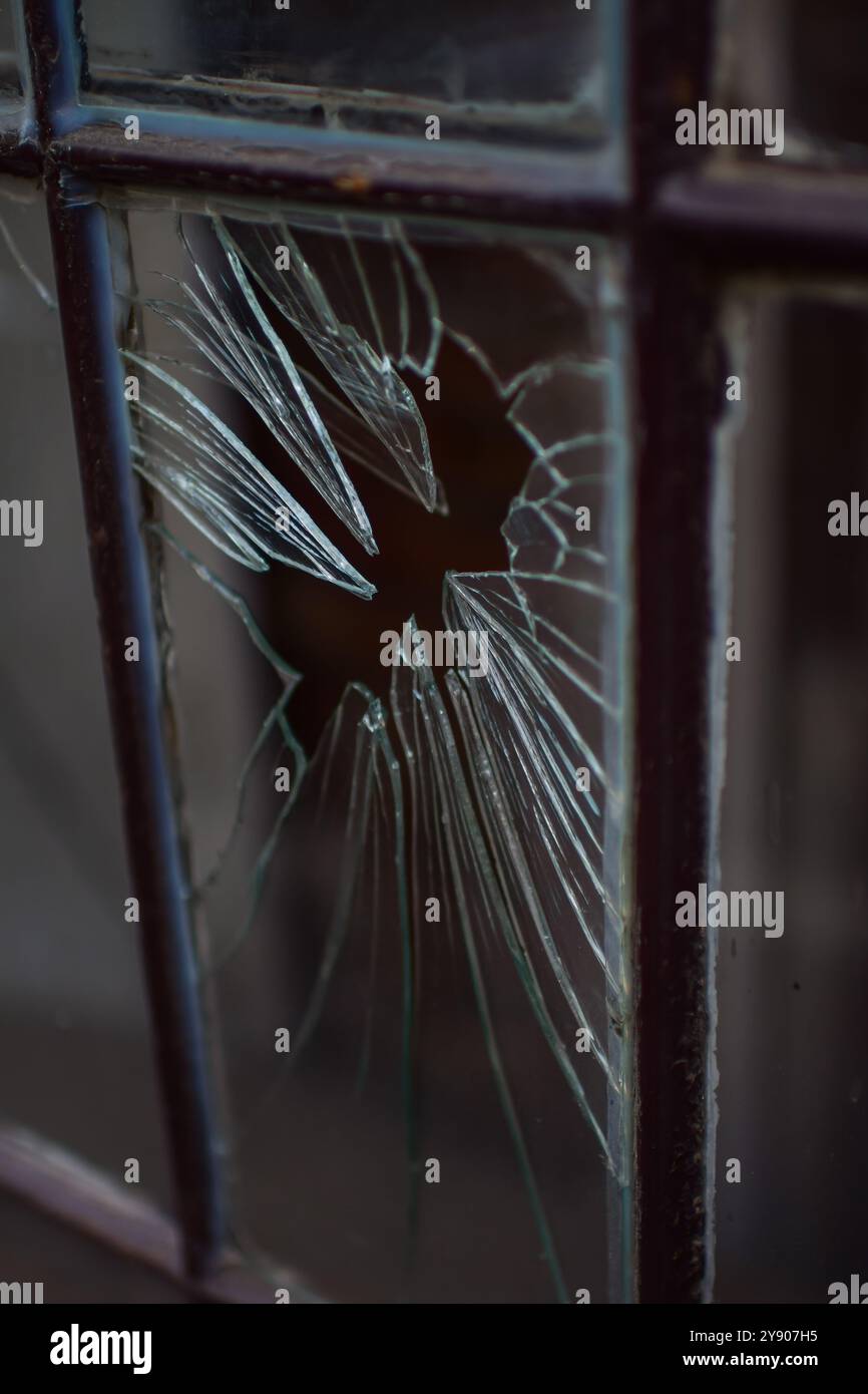 Broken glass in door Stock Photo - Alamy