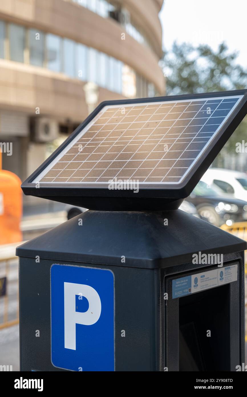 Solar panel powered urban parking meter Stock Photo - Alamy