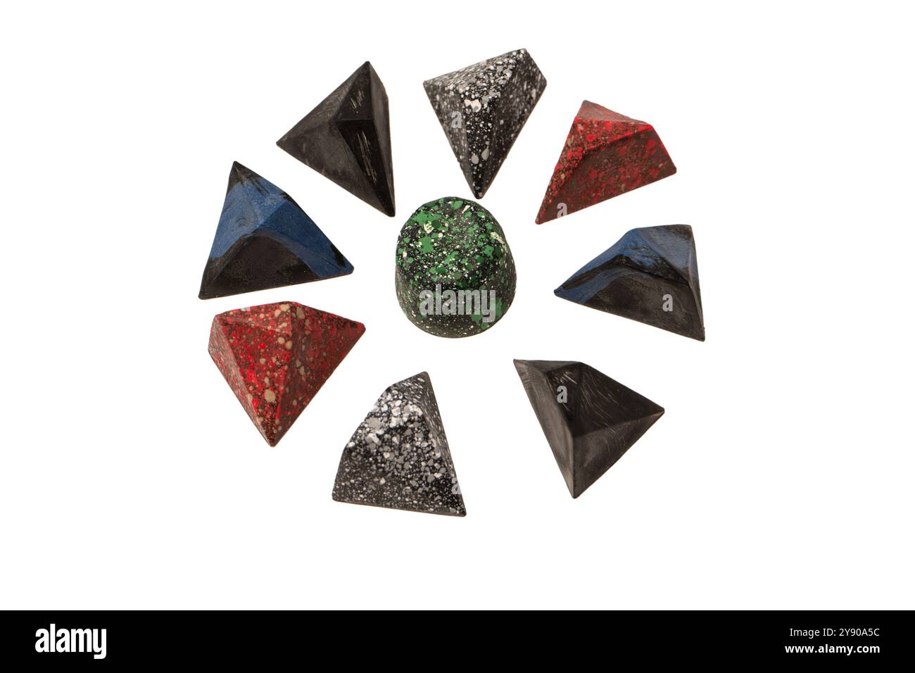 Chocolate candies in the form of precious stones, with marble texture ...