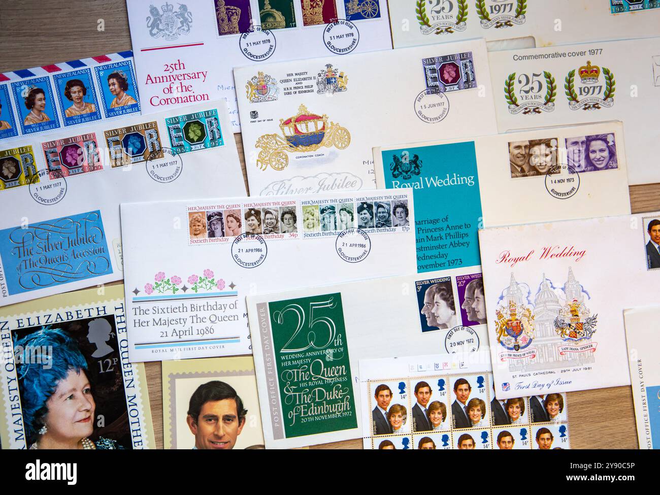 A collection of colorful British commemorative stamps and first day ...