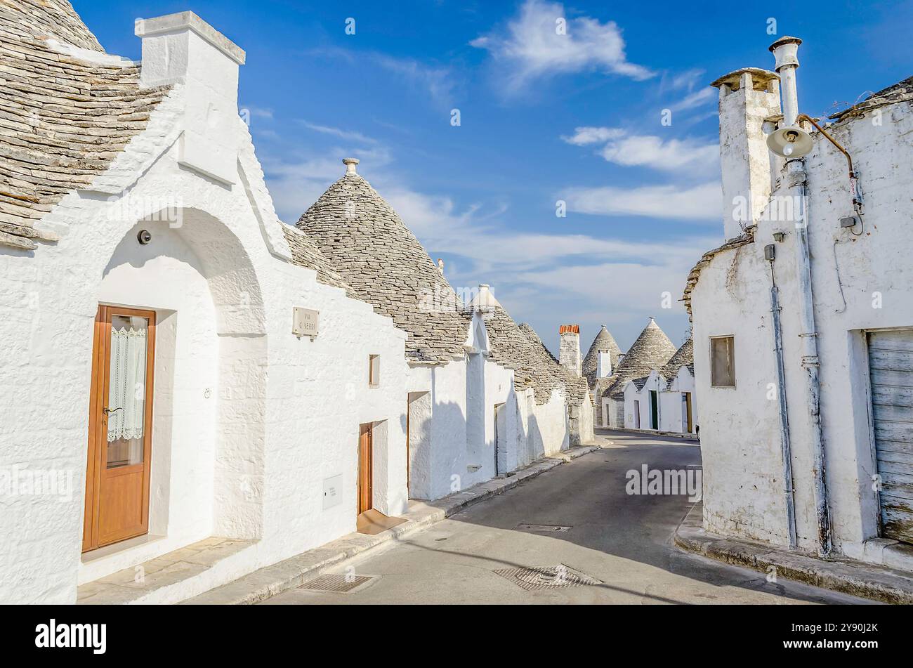 Typical trulli buildings with conical roofs in Alberobello, Apulia ...