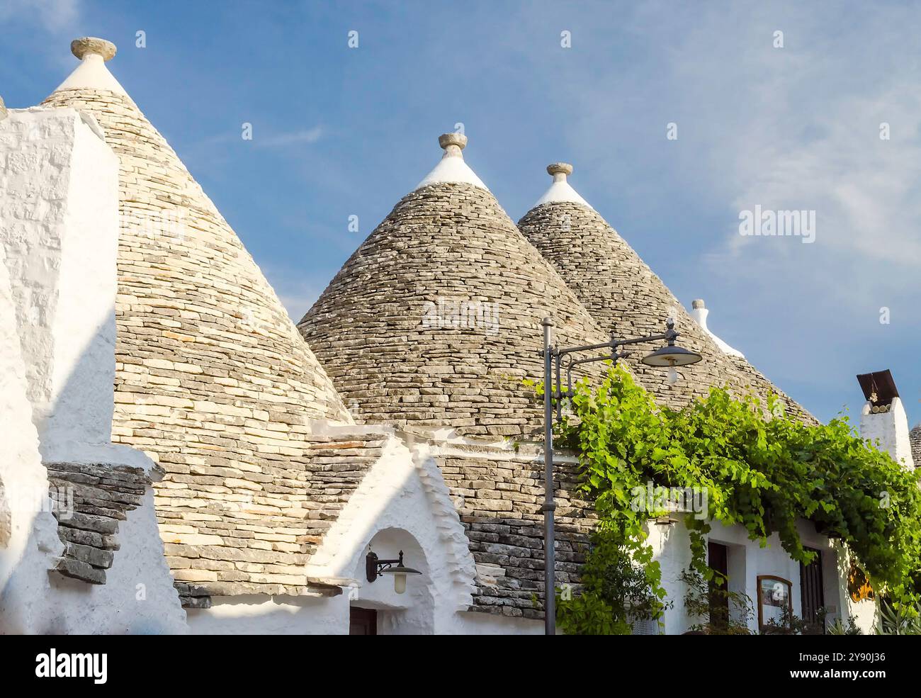 Typical trulli buildings with conical roofs in Alberobello, Apulia ...