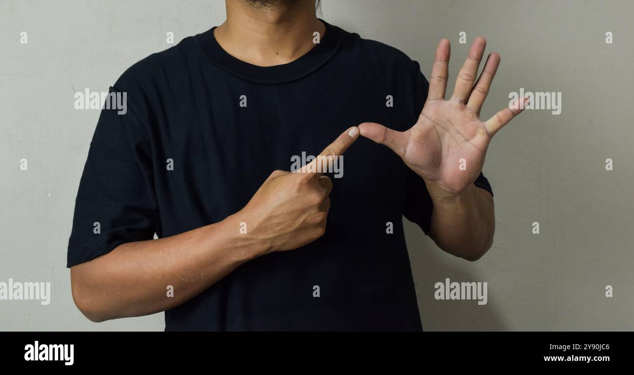 Close up Asian man shows hand gestures it means human emotion and ...