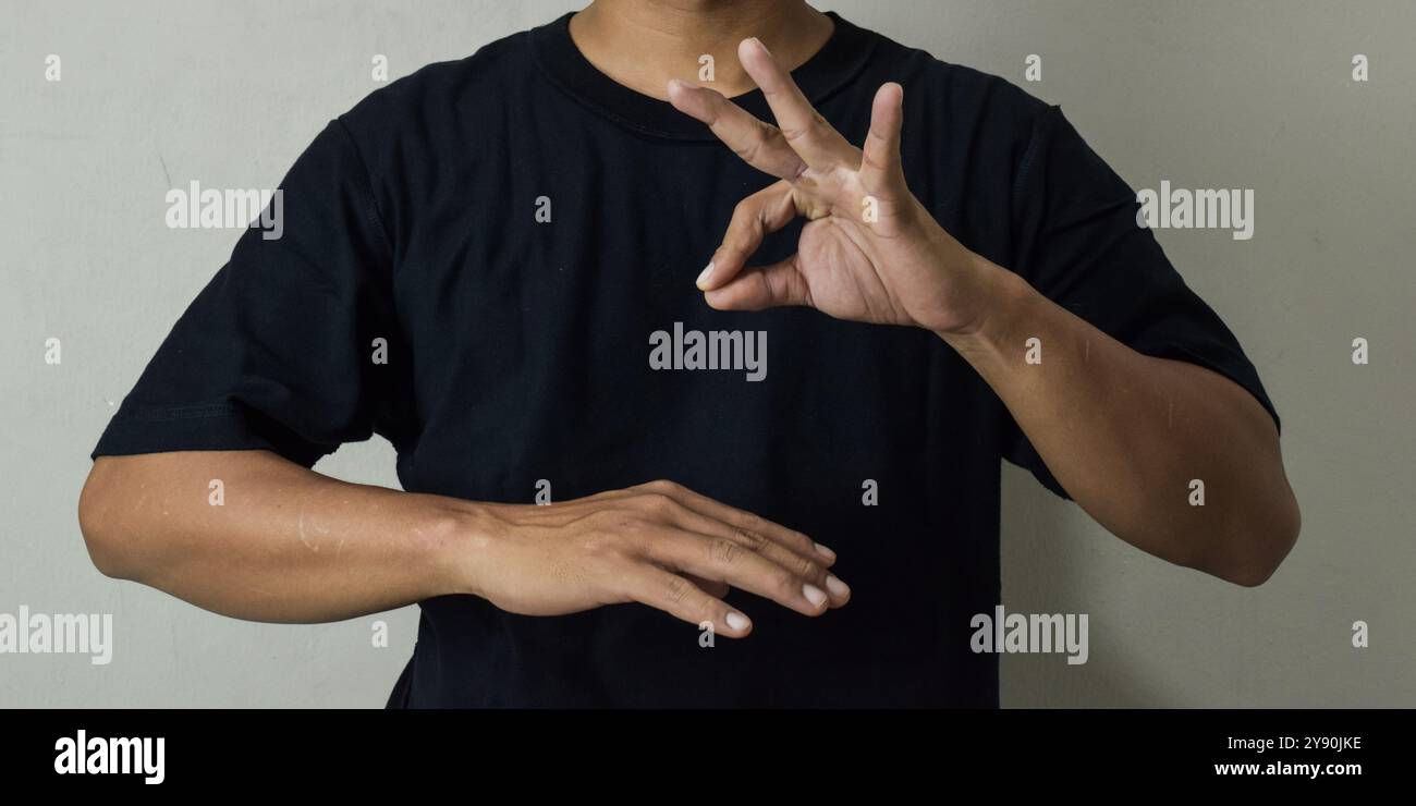 Close up Asian man shows hand gestures it means human emotion and ...