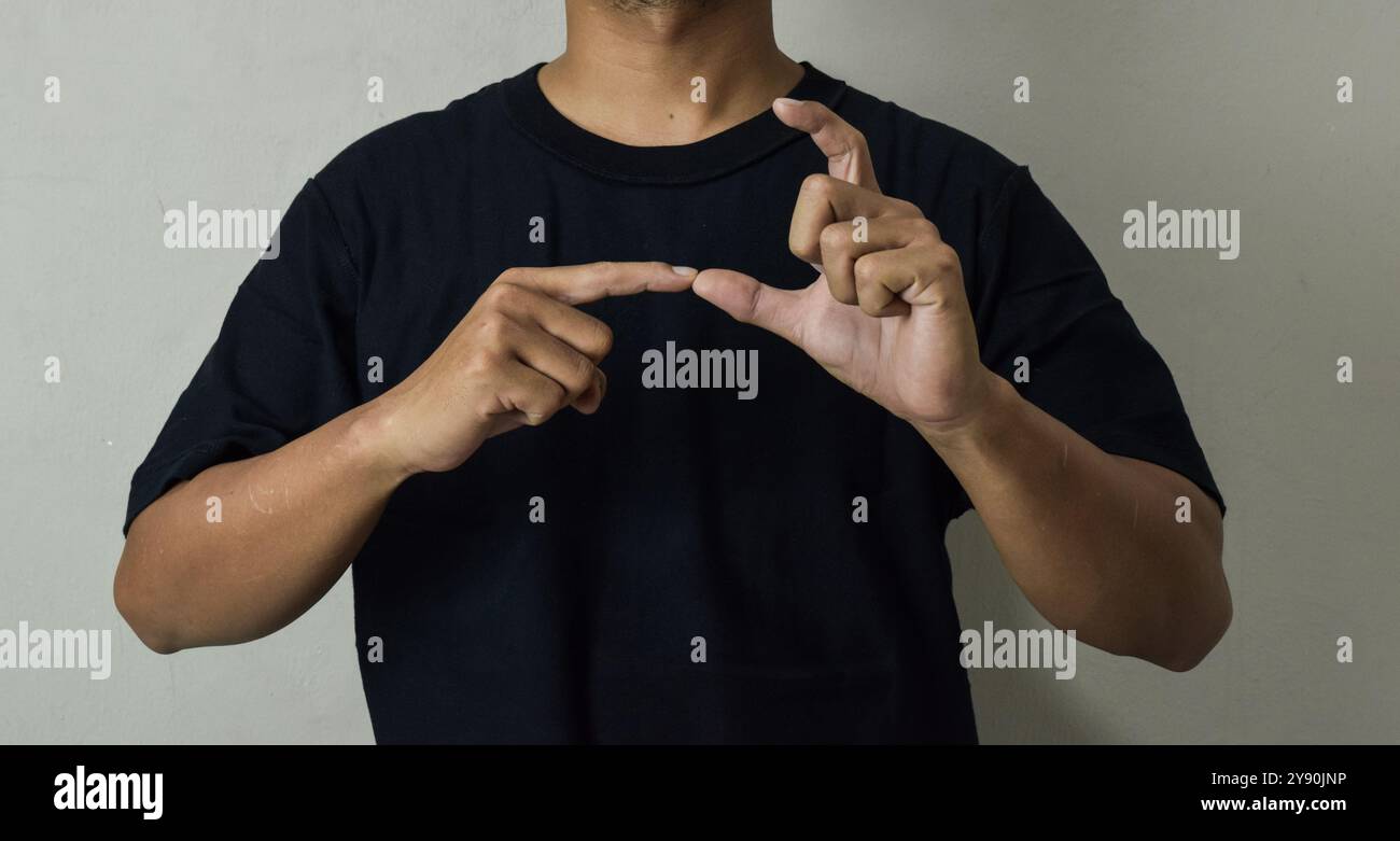 Close up Asian man shows hand gestures it means human emotion and ...