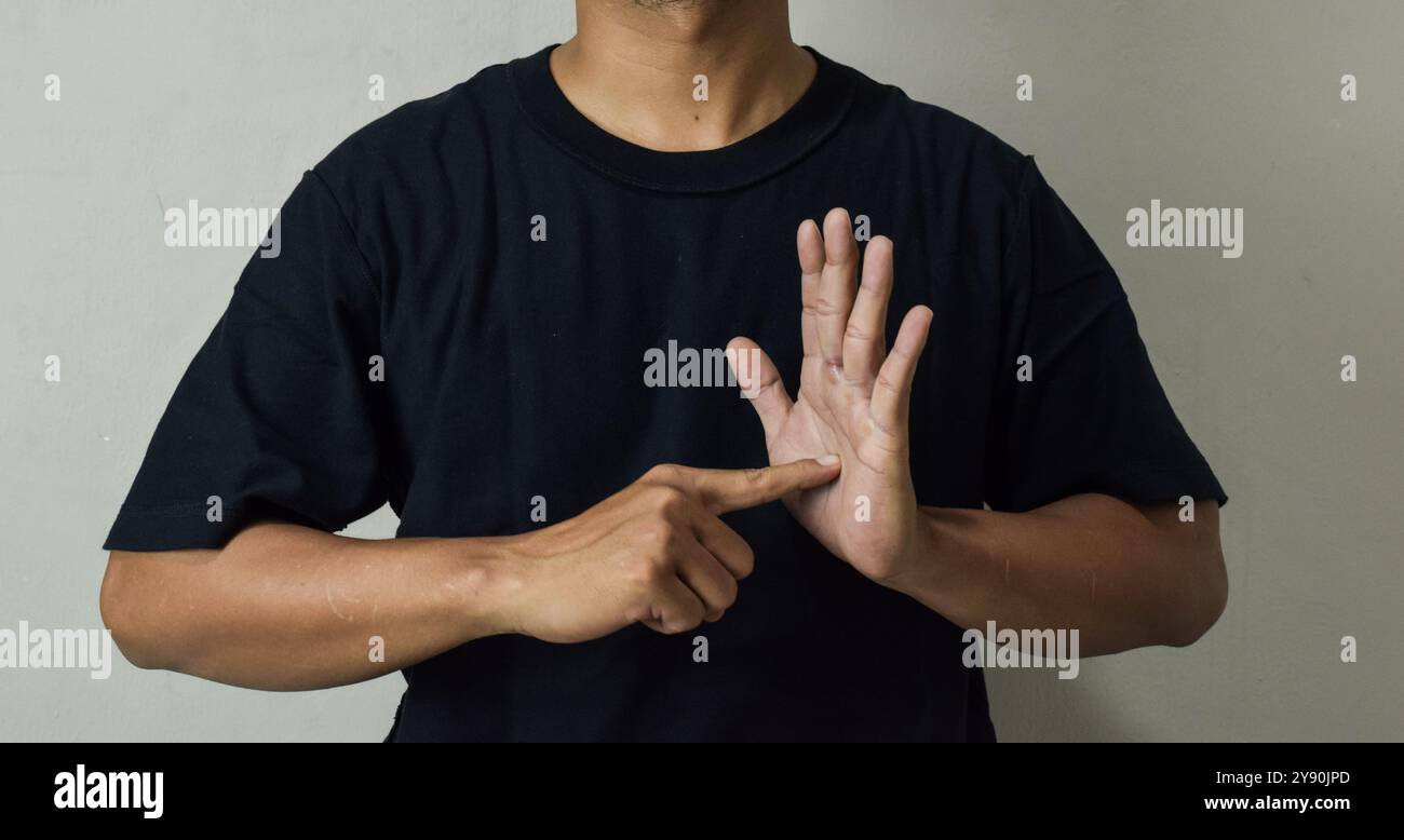 Close up Asian man shows hand gestures it means human emotion and ...