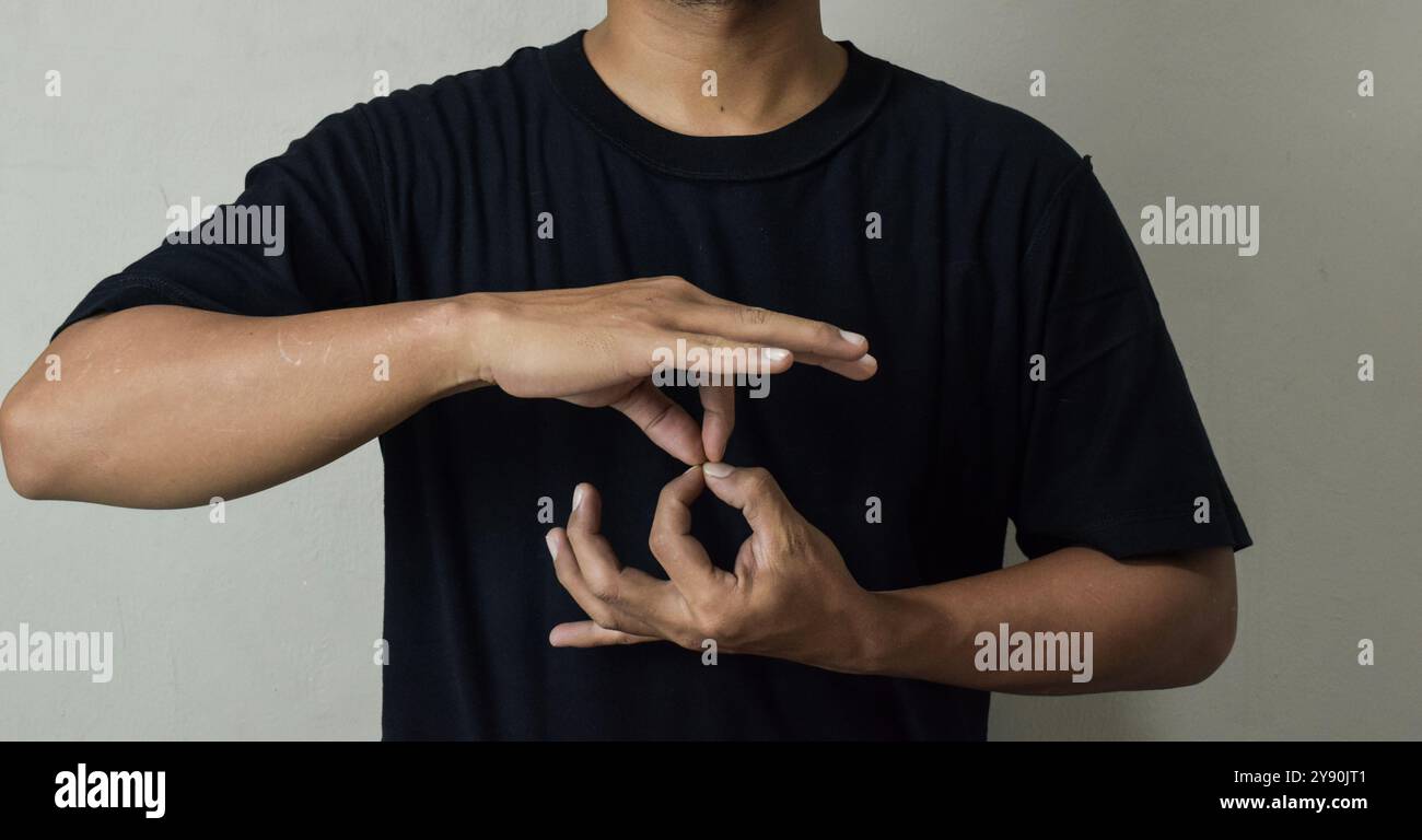 Close up Asian man shows hand gestures it means human emotion and ...
