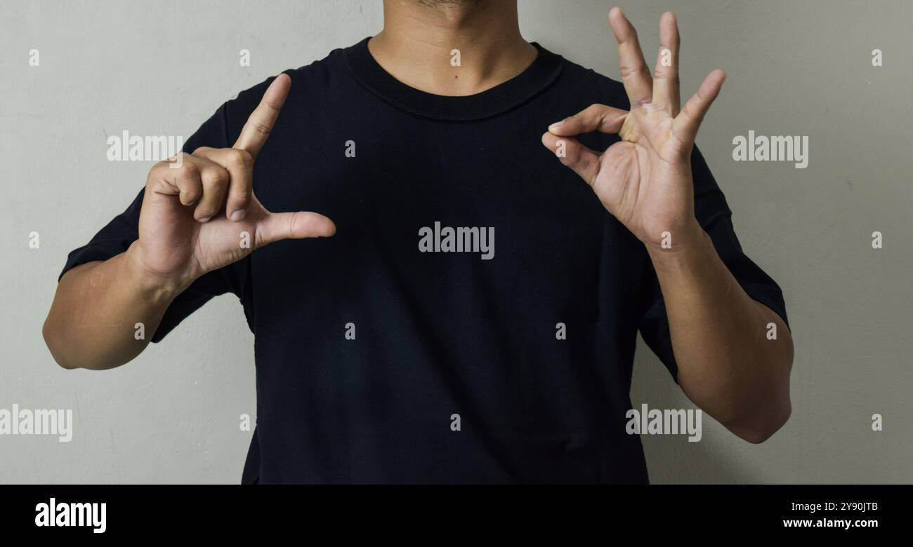 Close up Asian man shows hand gestures it means human emotion and ...
