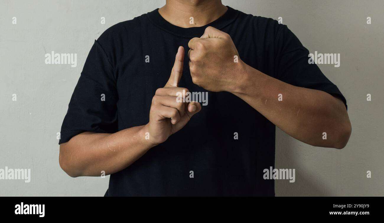 Close up Asian man shows hand gestures it means human emotion and ...