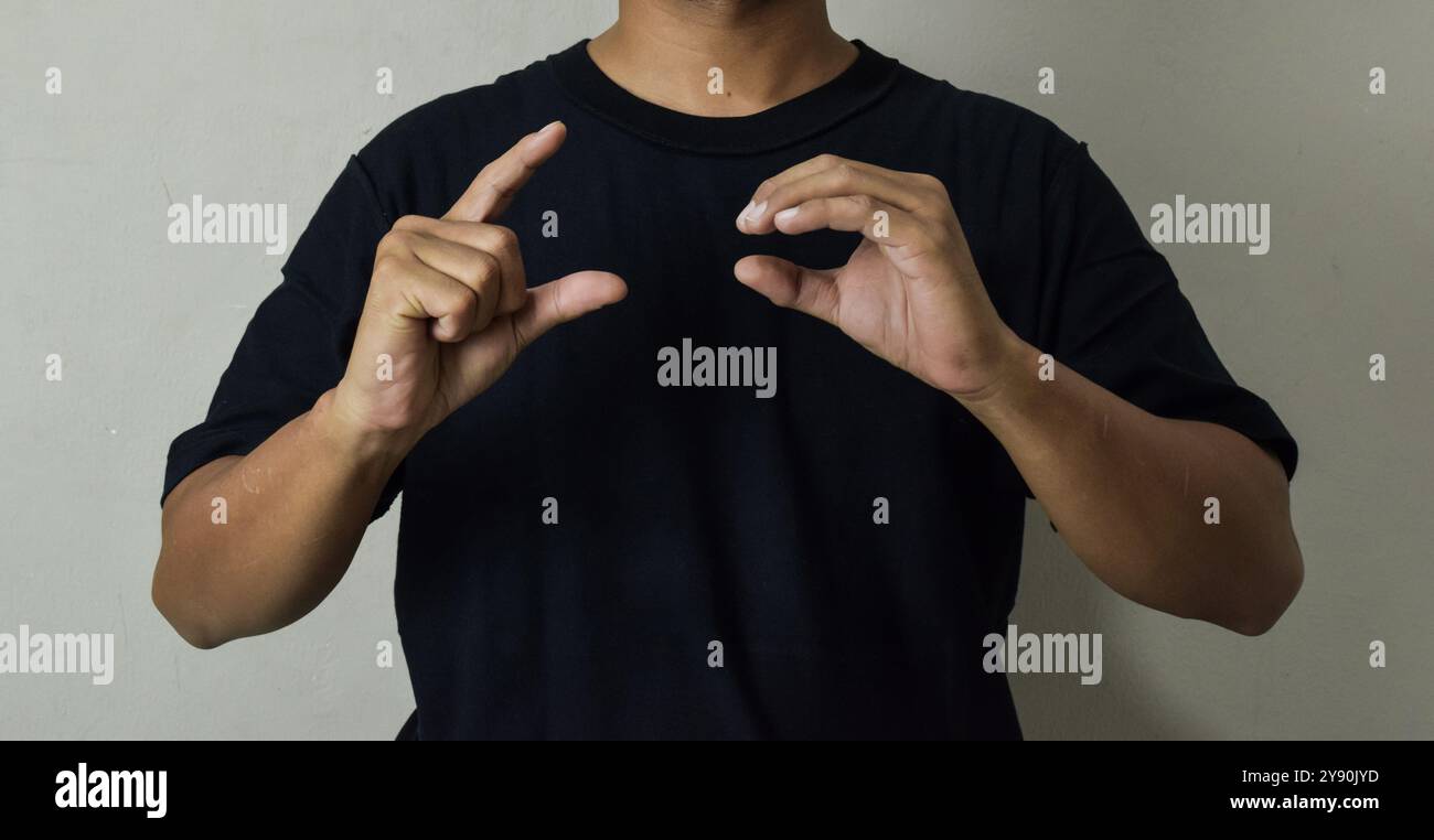 Close up Asian man shows hand gestures it means human emotion and ...