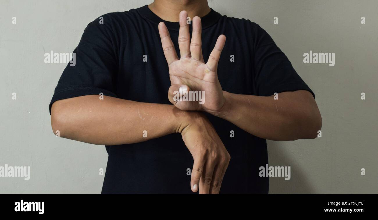 Close up Asian man shows hand gestures it means human emotion and ...