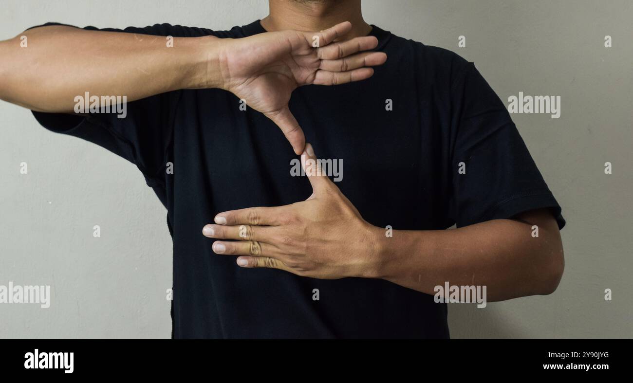 Close up Asian man shows hand gestures it means human emotion and ...