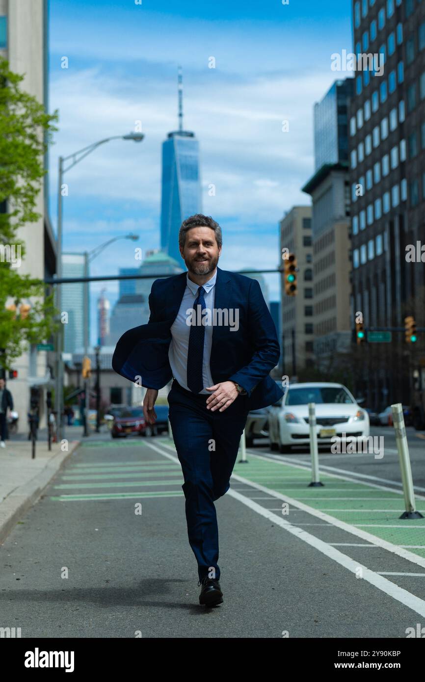 Business man run in NY. American business. Businessman run down street ...