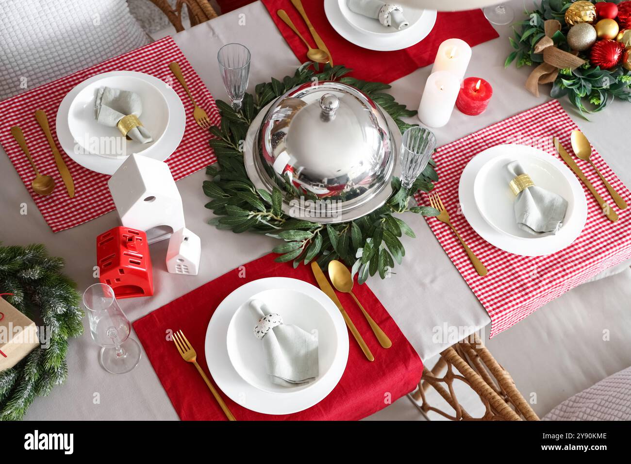 Christmas table setting with wreathes, decorations and cloche Stock ...