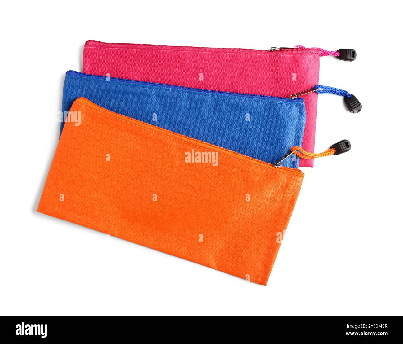 Colorful pencil cases on white background Stock Photo - Alamy