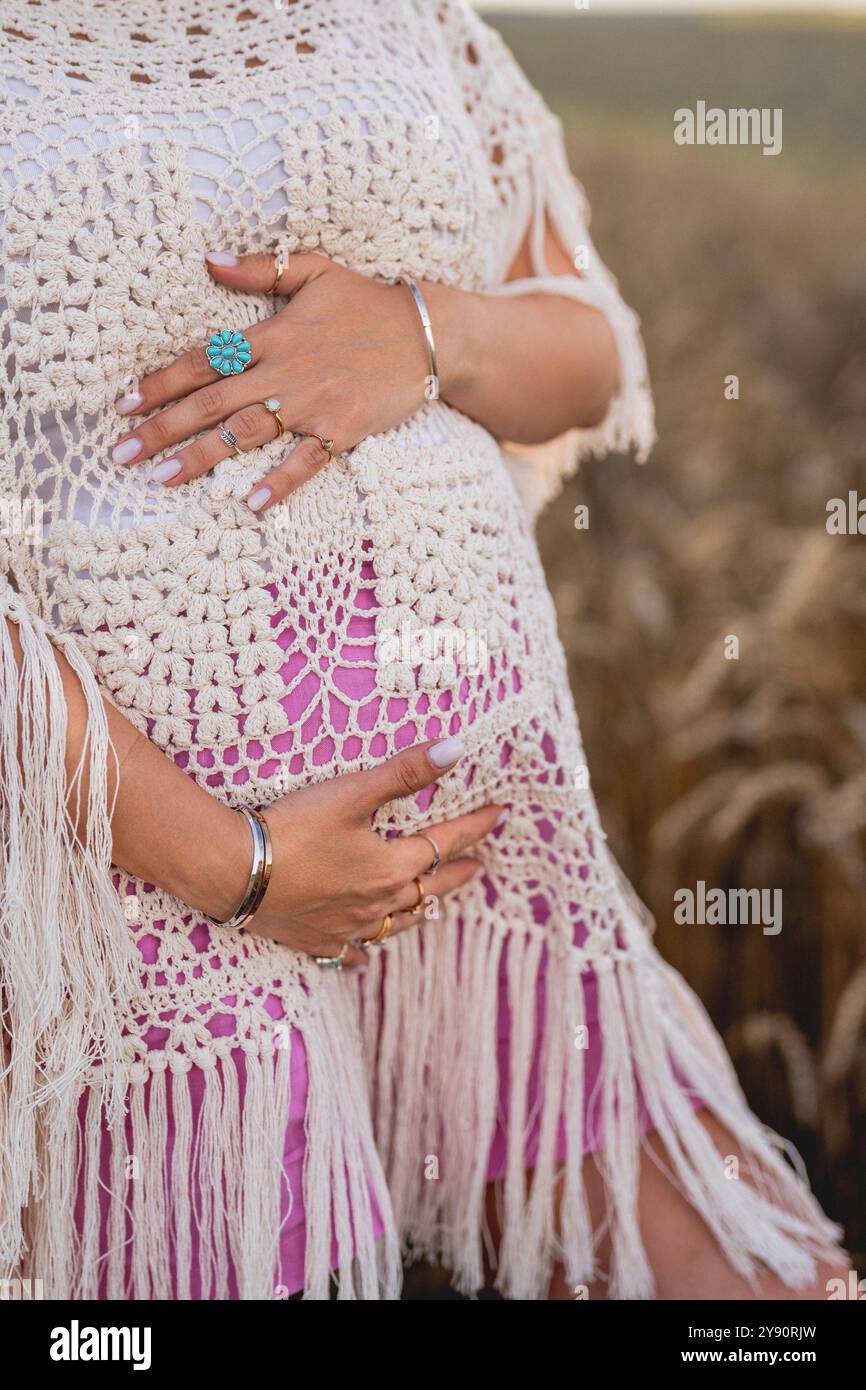Bohemian Style Dressed Pregnant Hippie Woman Holding Belly, Natural ...