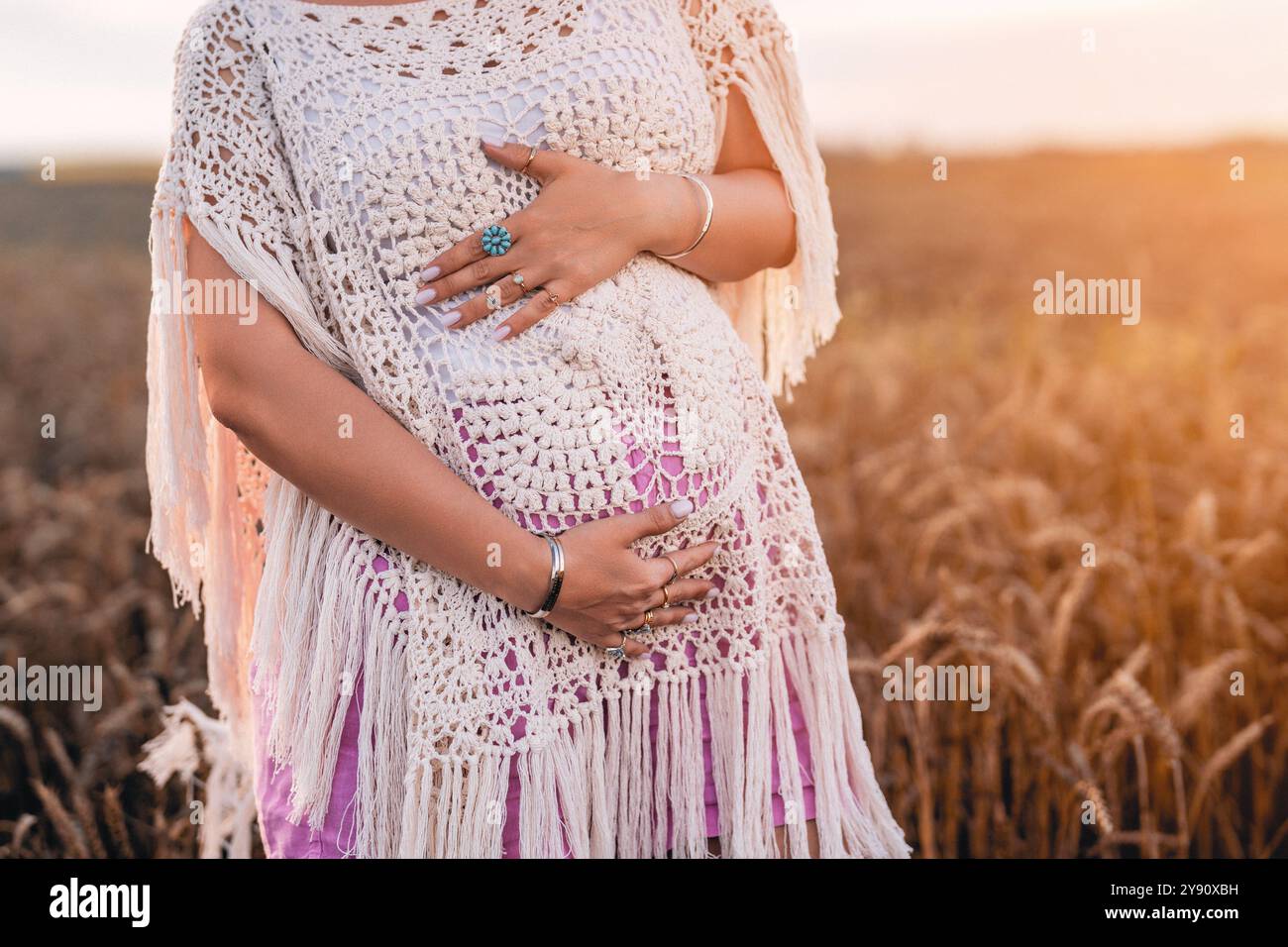 Bohemian Style Dressed Pregnant Hippie Woman Holding Belly, Natural ...