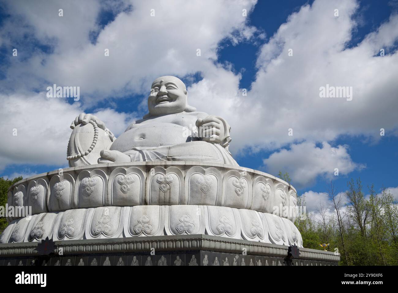Peterborough, Ontario, Canada / 05-18-2024: The stone statue of Happy ...