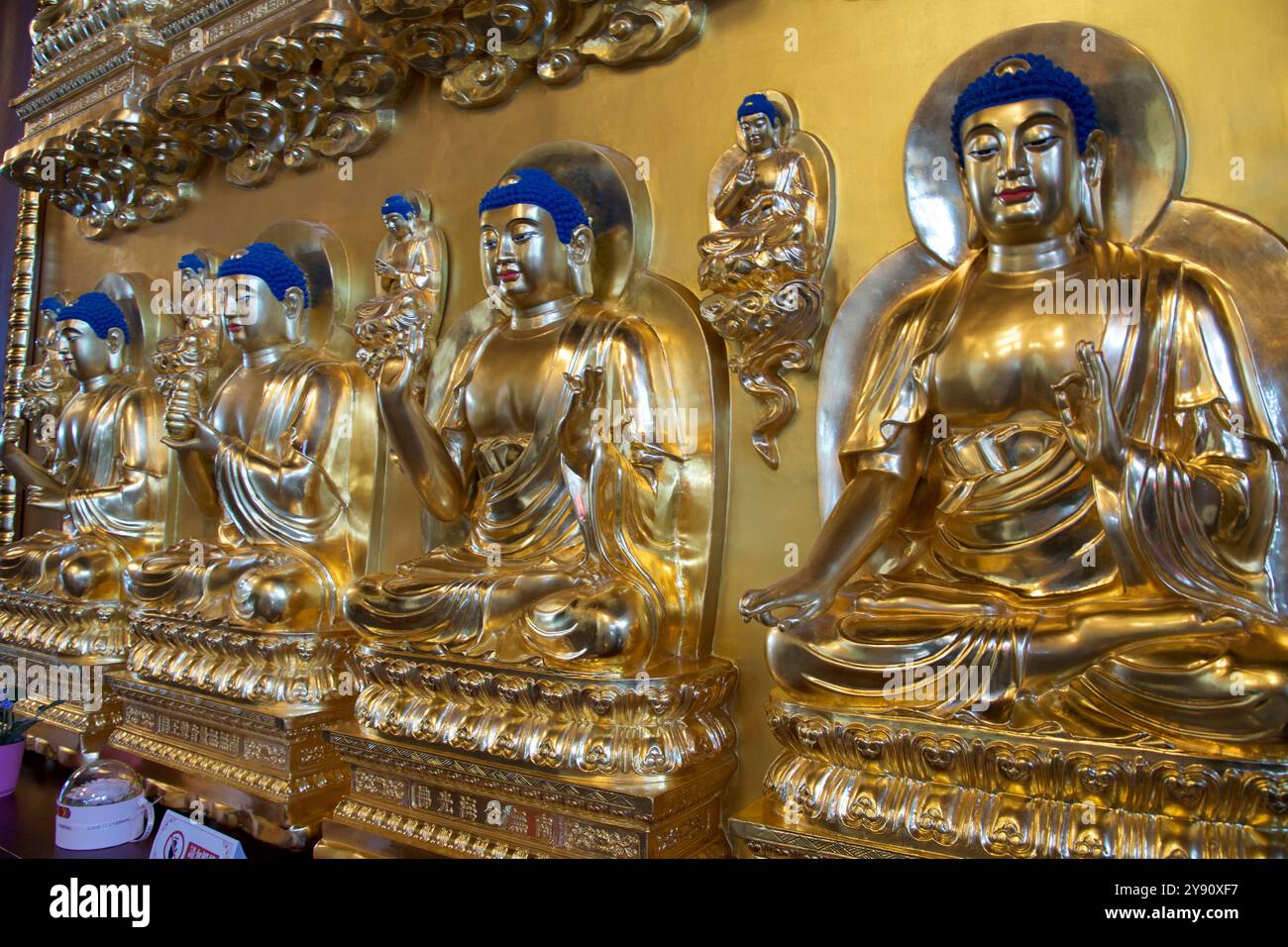 Peterborough, Ontario, Canada / 05-18-2024: The shining golden Buddha ...