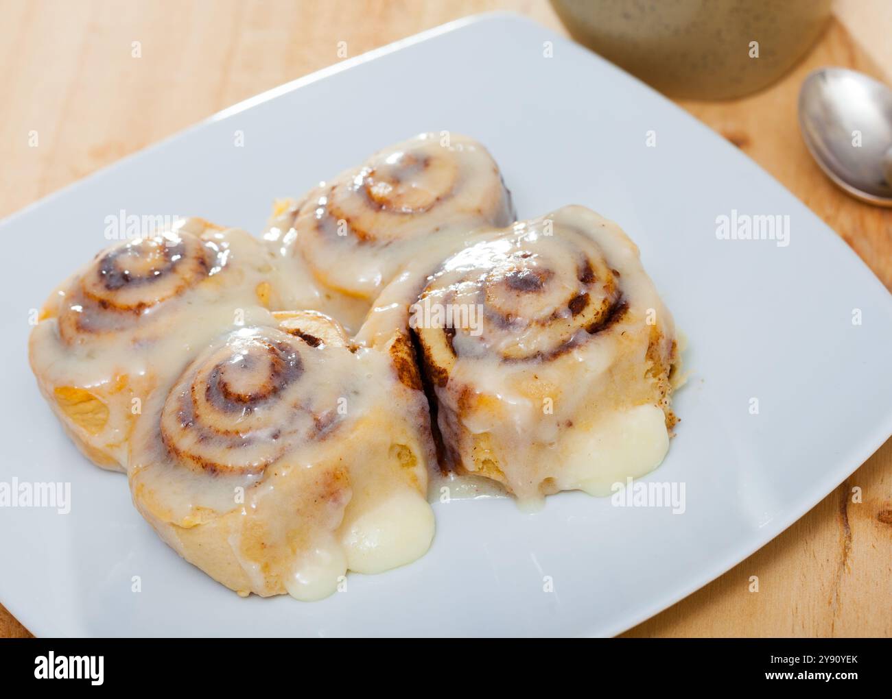 Vegan cinnabon rolls with topping Stock Photo - Alamy