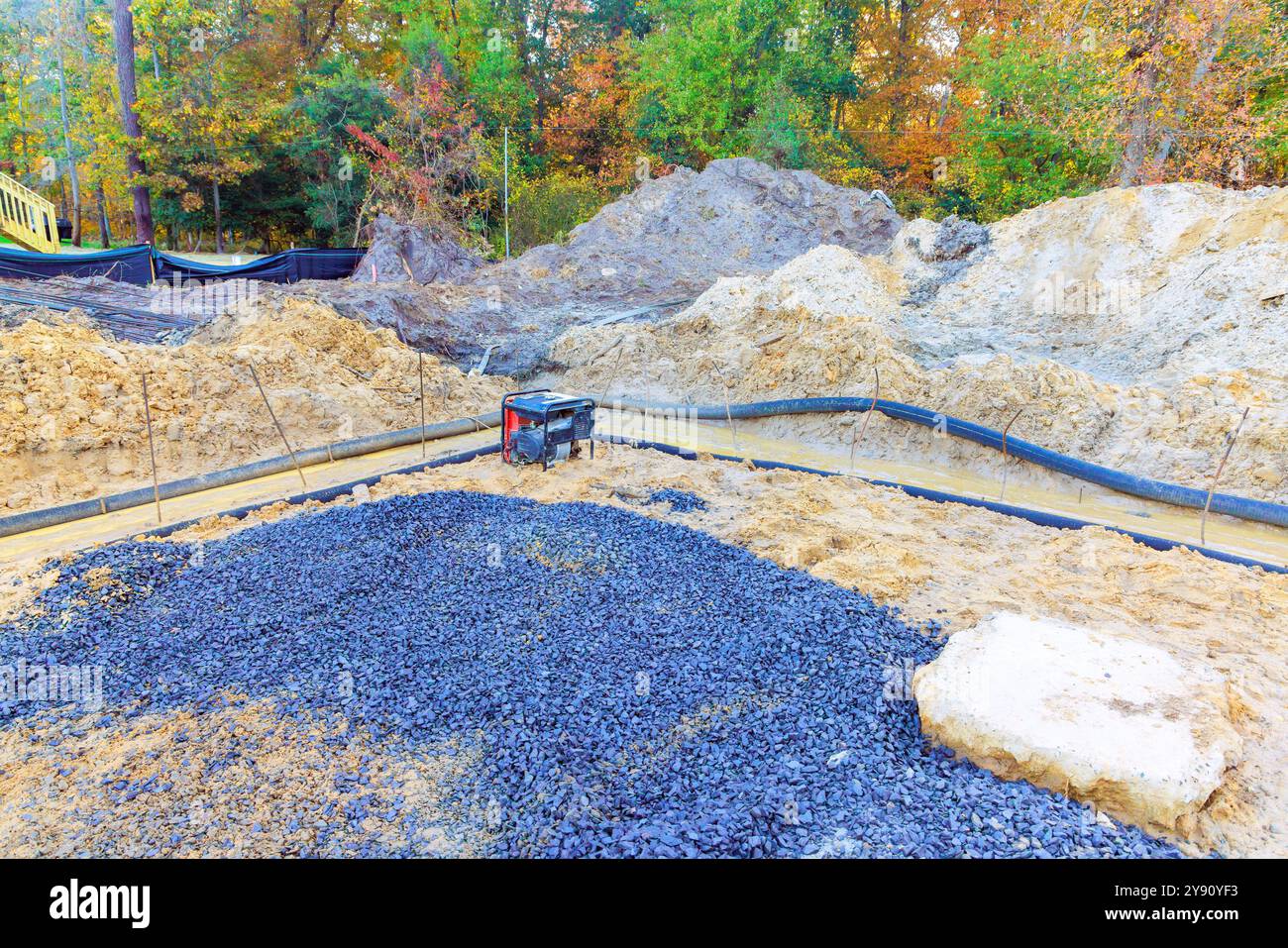 In construction of building, preparation ground foundation to ...