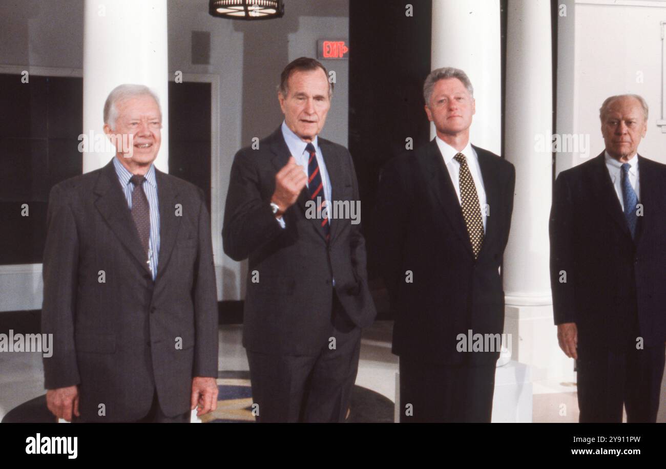 Three former U.S. Presidents--JIMMY CARTER (left), GEORGE H.W. BUSH ...