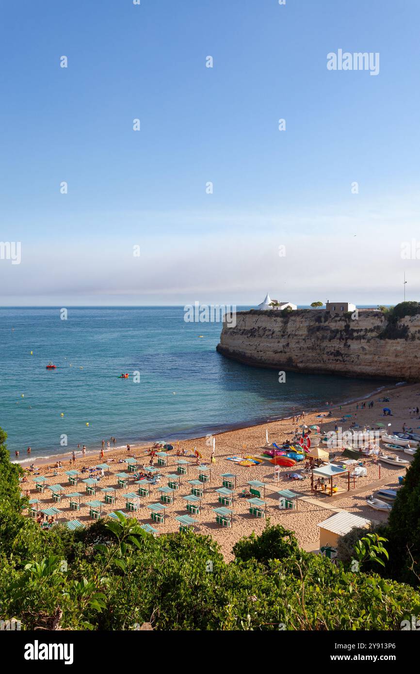 Praia da Nossa Senhora da Rocha, a small beach, in the seaside town of ...