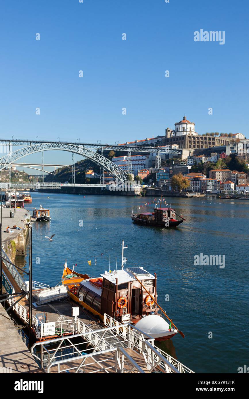 A traditional Port wines Barge travelling on the river Douro in Porto ...