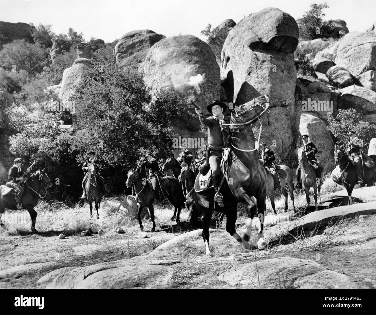 Don Kelly (foreground, center), on-set of the western film, "Frontier ...