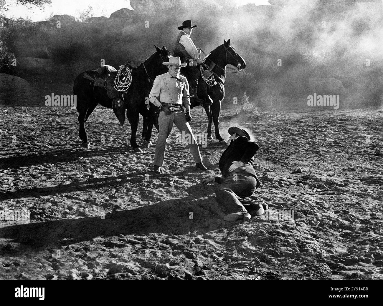 Jack Holt (standing),on-set of the western film, "The Gallant Legion ...