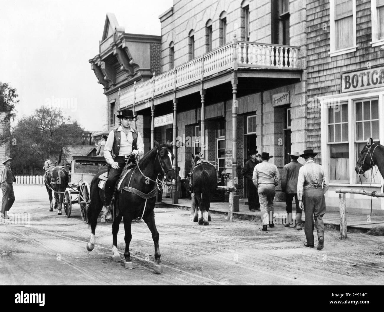 Rory Calhoun (on horse), on-set of the western film, "Domino Kid ...