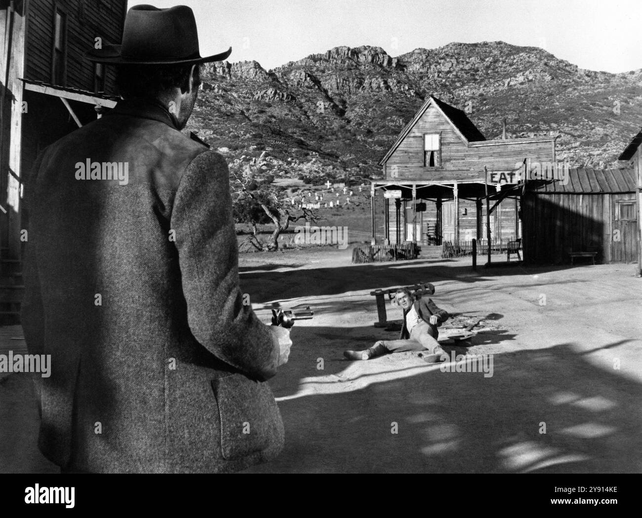 Henry Fonda (left), James Stewart (right), on-set of the western film ...