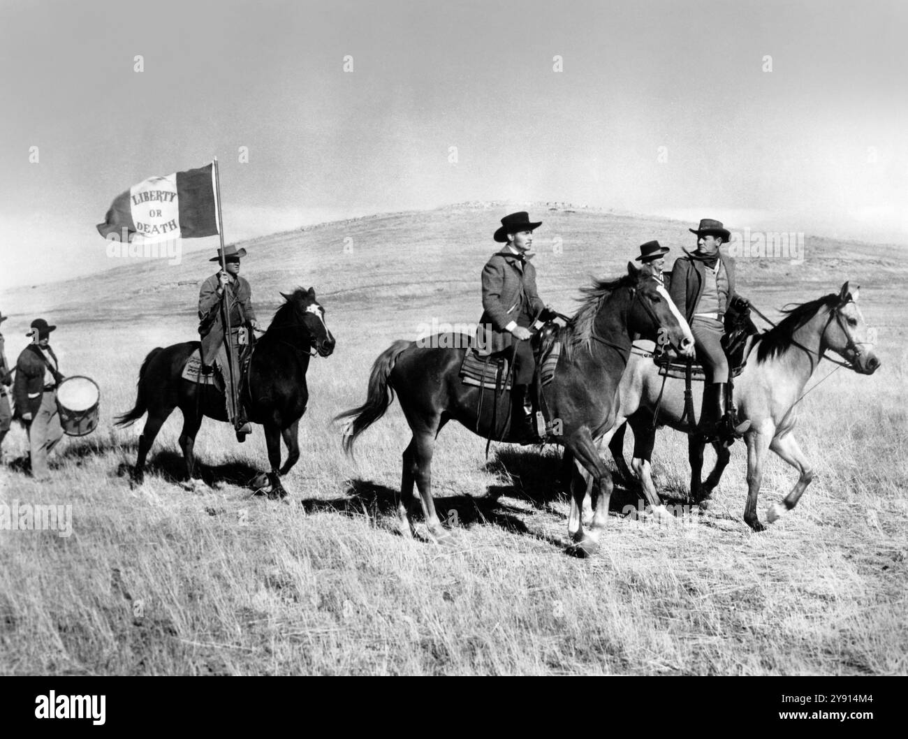Nelson Leigh, Joel McCrea, Roy Roberts, on-set of the western film ...