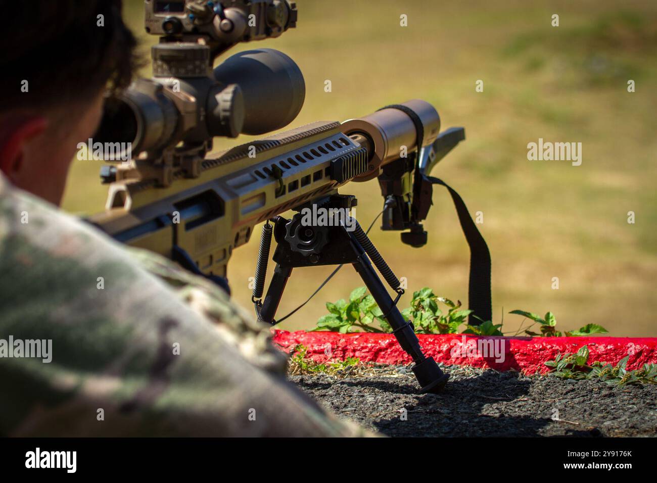 A Soldier assigned to 25th Infantry Division shoots a Mk-22 sniper ...