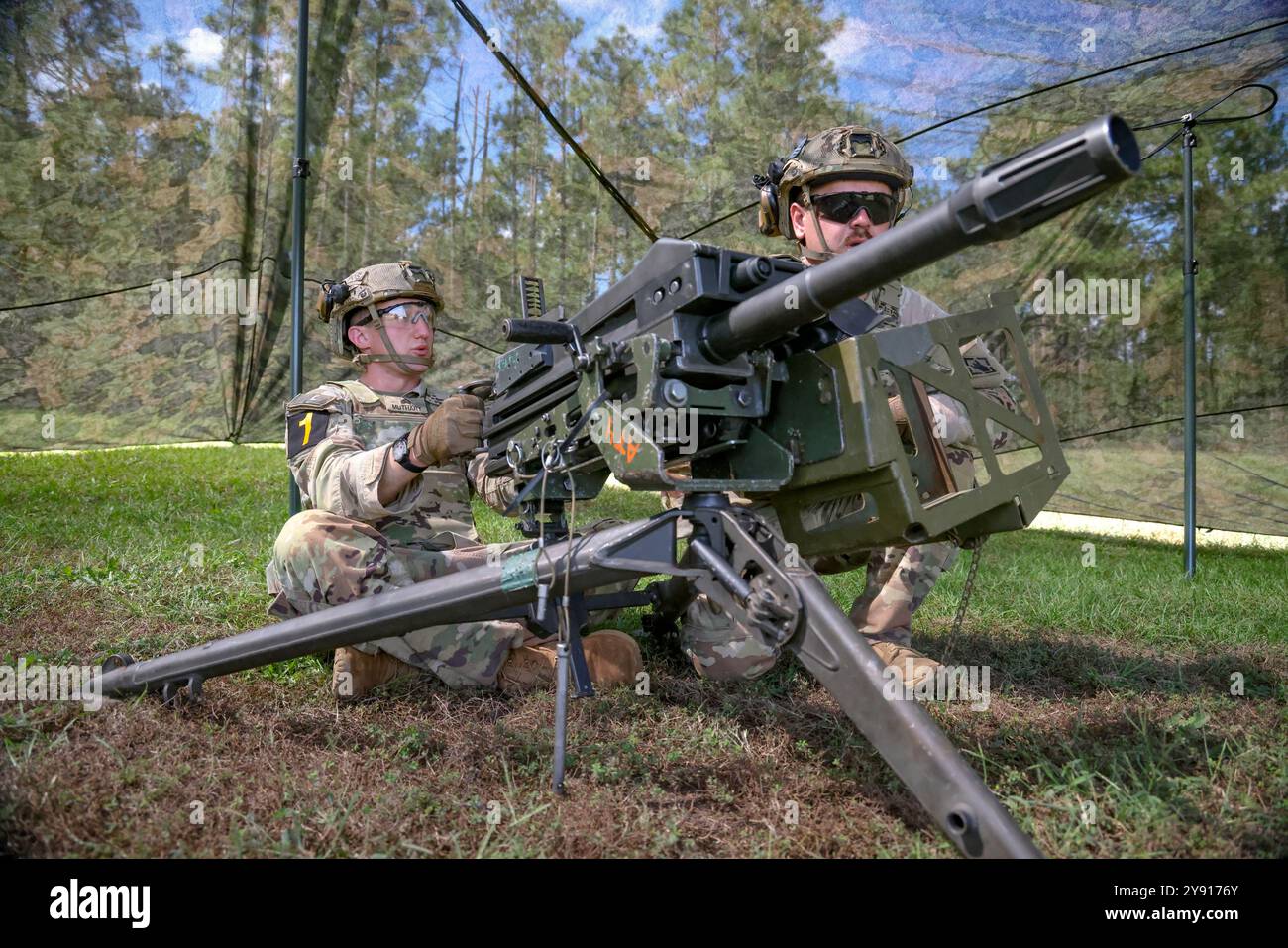 U.S. Army Sgt. Steven Muthart and Sgt. Hunter Bryant, combat engineers ...