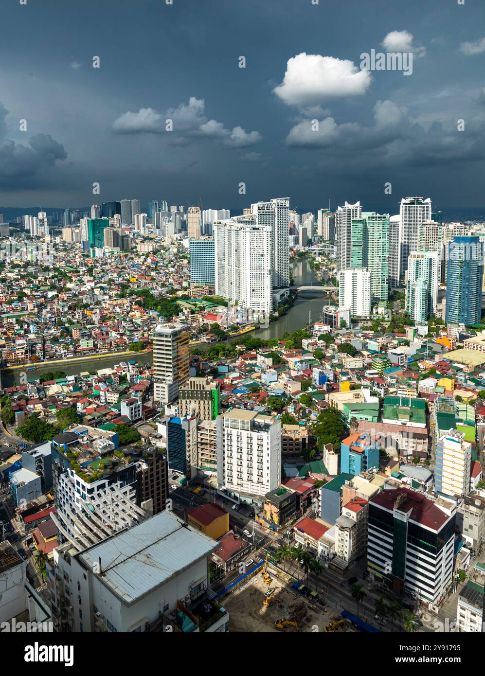 The capital city brightly lit,near to sunset,contrasting with a dark ...