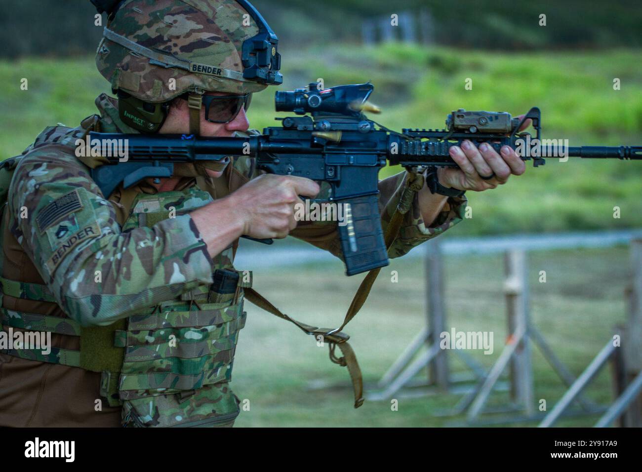 A Soldier assigned to 25th Infantry Division practices shooting drills ...