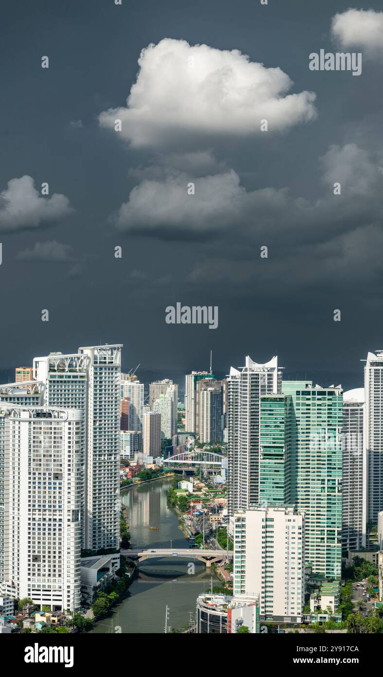 The capital city brightly lit,near to sunset,contrasting with a dark ...