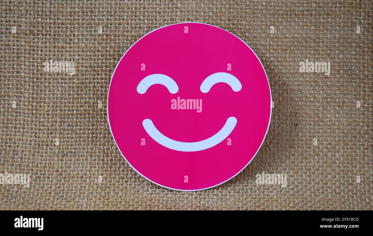 smiling emoji isolated on black background Stock Photo - Alamy