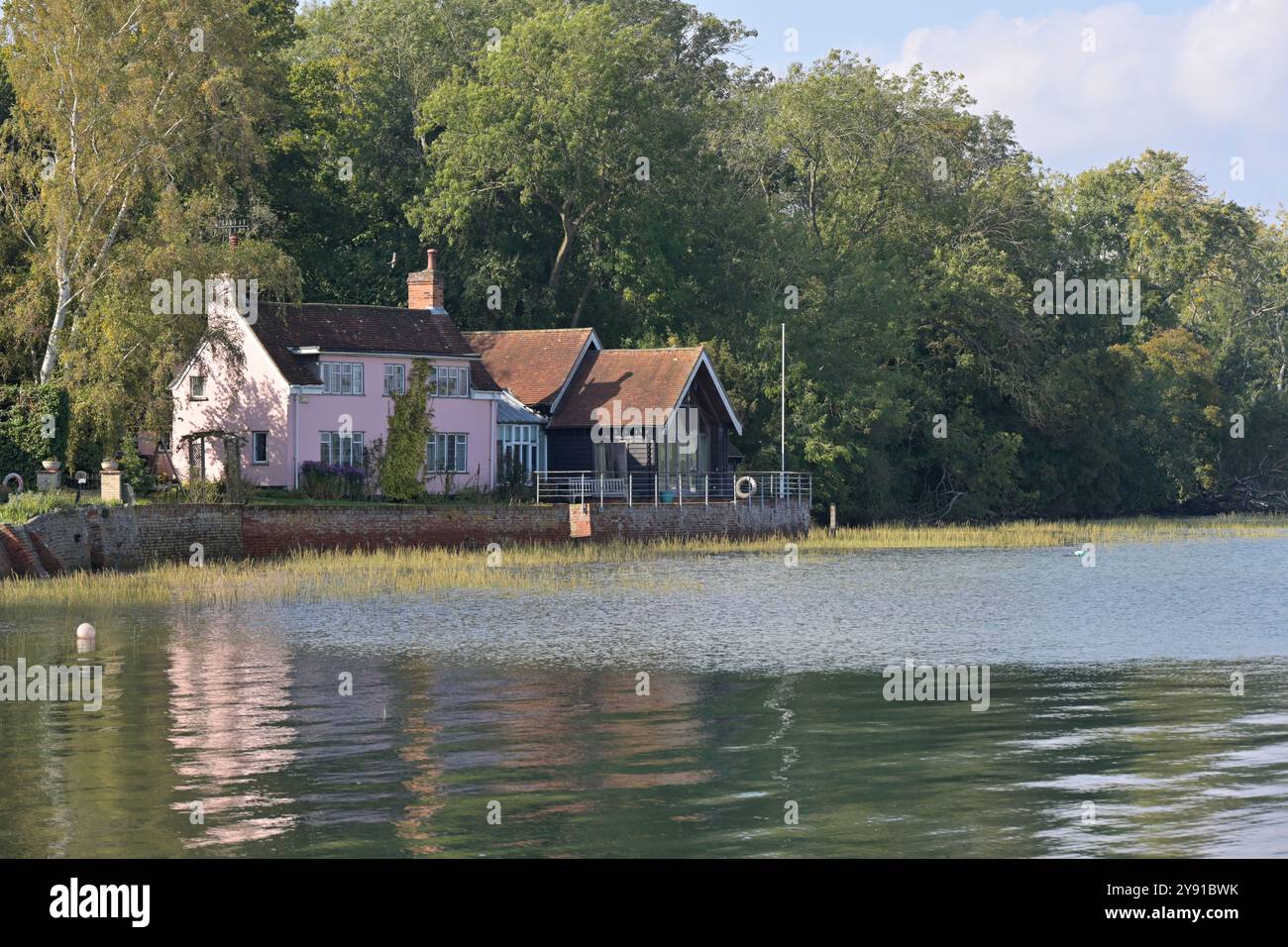 riverside cottage at high water, beside river orwell, pin mill, suffolk ...