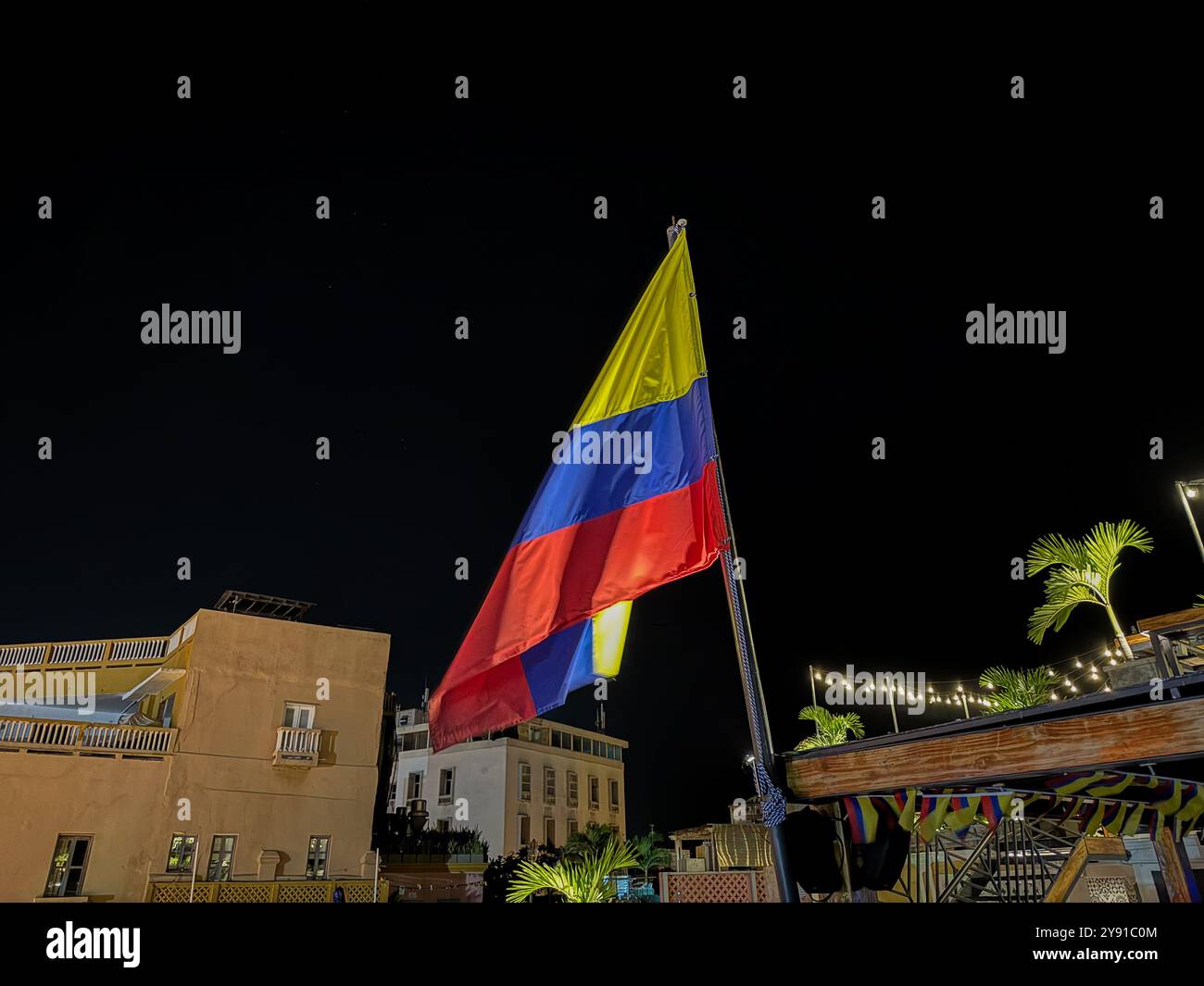 View of the beautiful waving flag of Colombia and Cartagena Stock Photo ...
