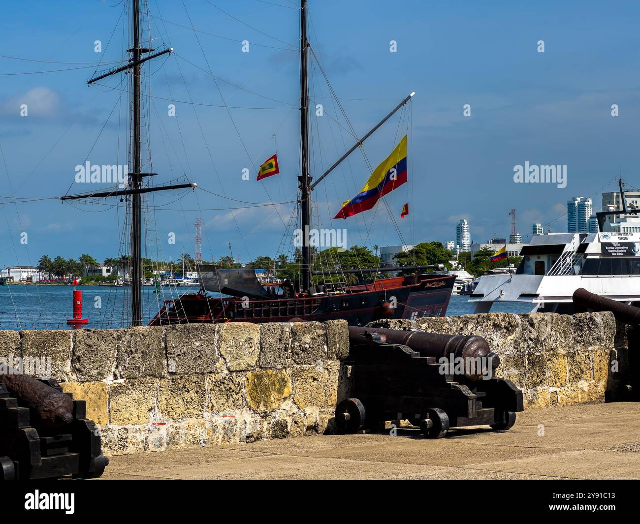 View of the beautiful waving flag of Colombia and Cartagena Stock Photo ...