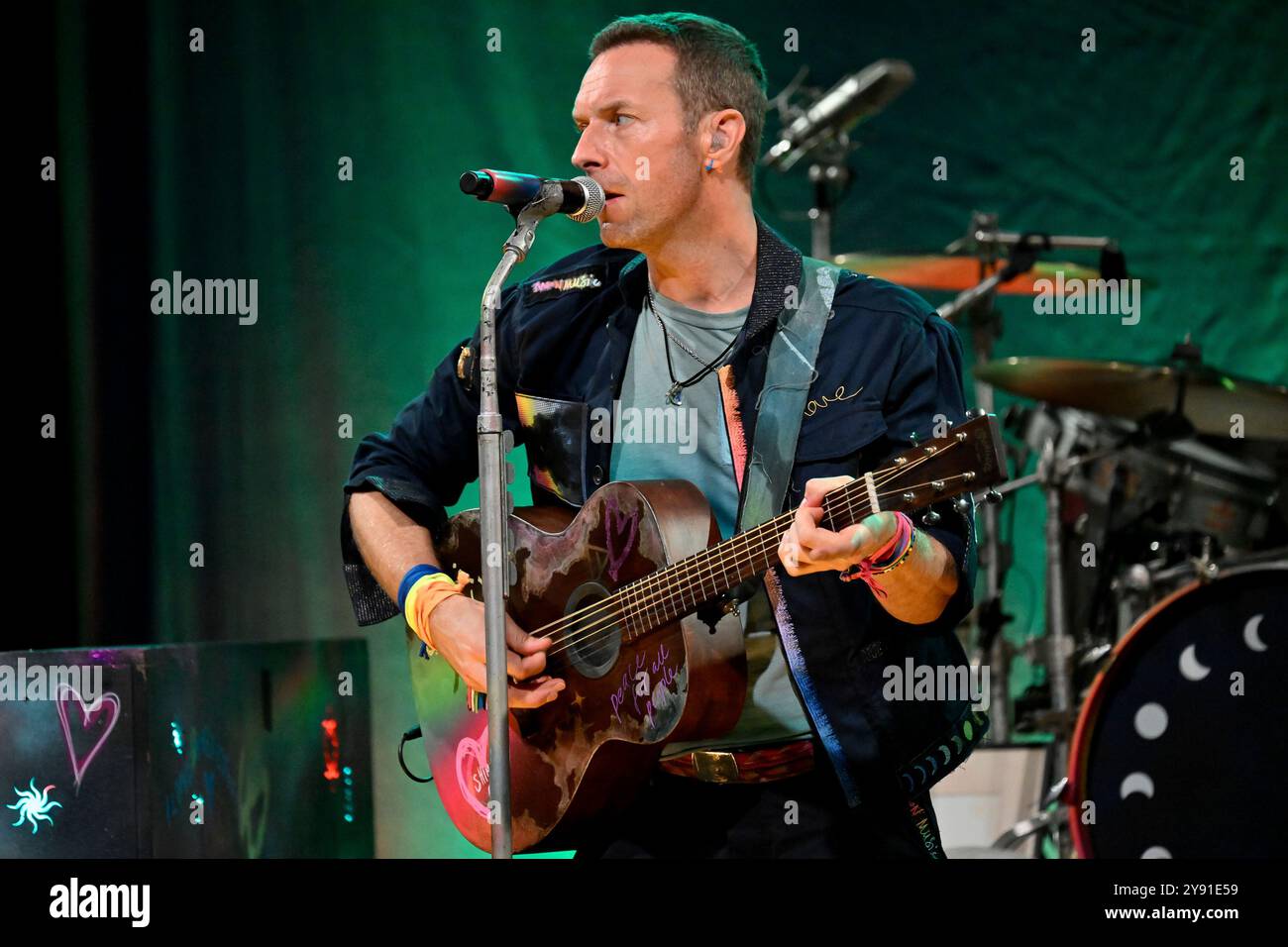 Musician Chris Martin of Coldplay performs during a SiriusXM concert at ...